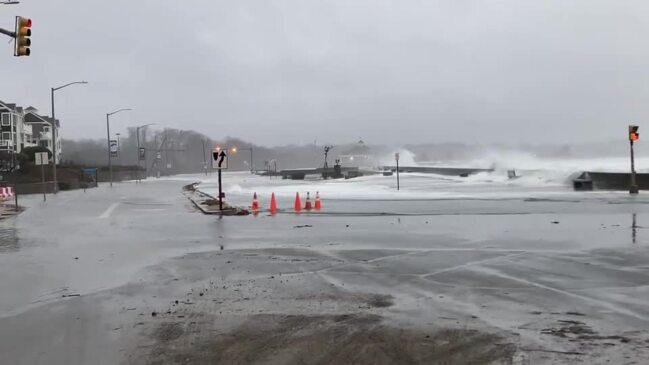 Waves Crash Over Rhode Island Seawall Amid Coastal Flooding Warnings