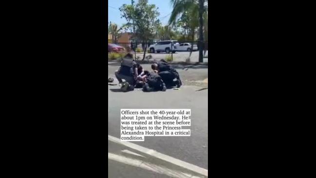 Man shot multiple times by police in Logan Central | The Courier Mail Man shot multiple times by police in Logan Central | The Courier Mail
